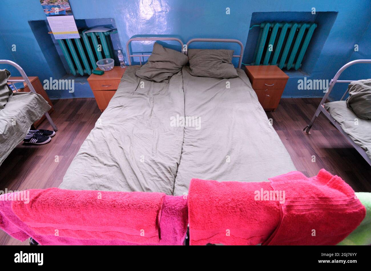 Cell for juvenile offenders: bunks, lockers, tables, benches and pegs ...