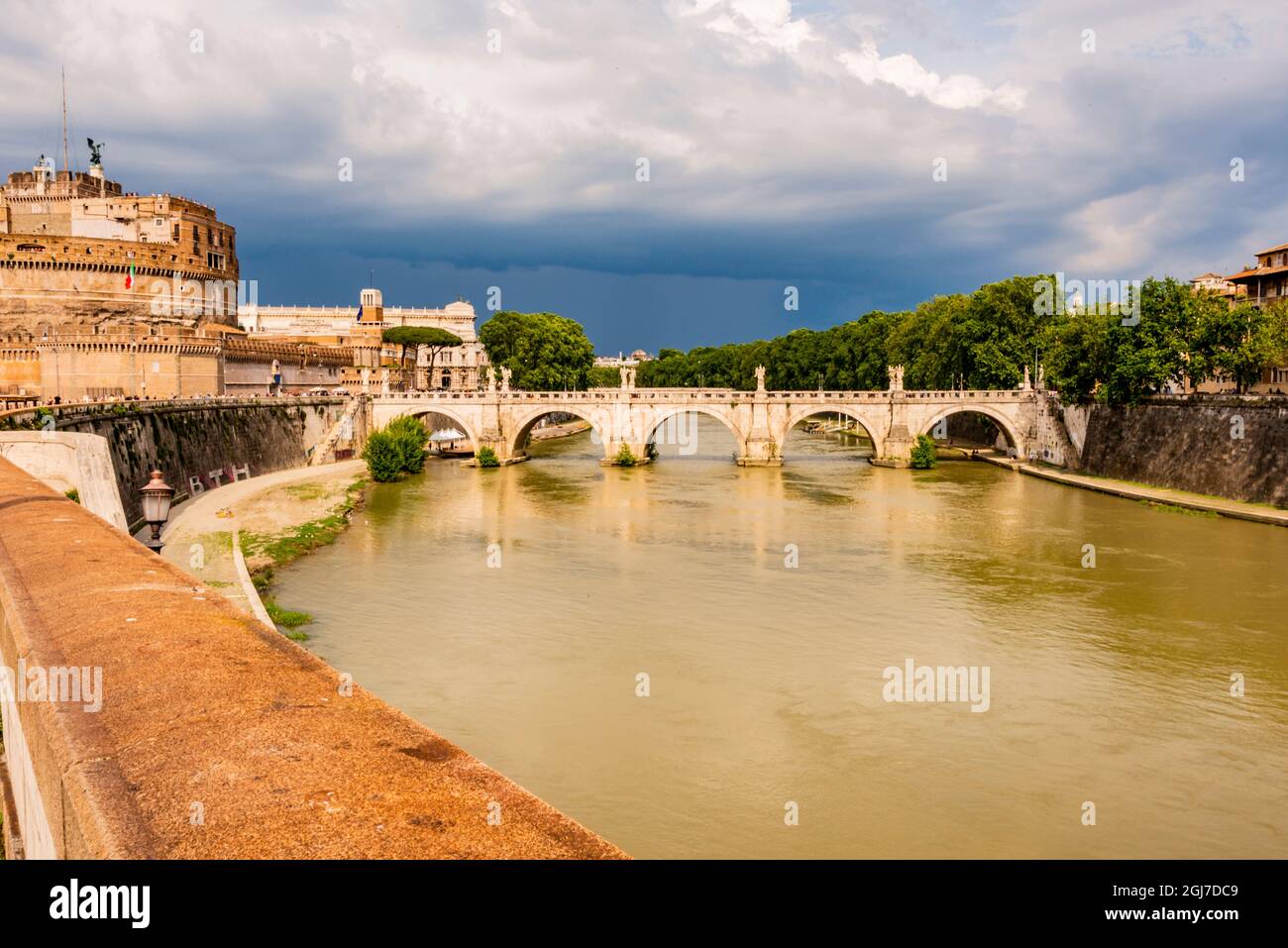 Italy, Rome. Tiber River, Castel Sant'Angelo, tourists on promenade ...