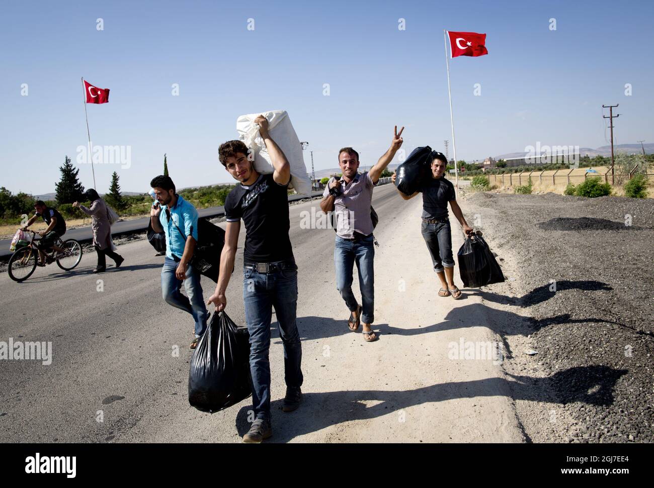 KILIS 2012-07-07 Syrians fleeing across the border into Turkey. Photo ...