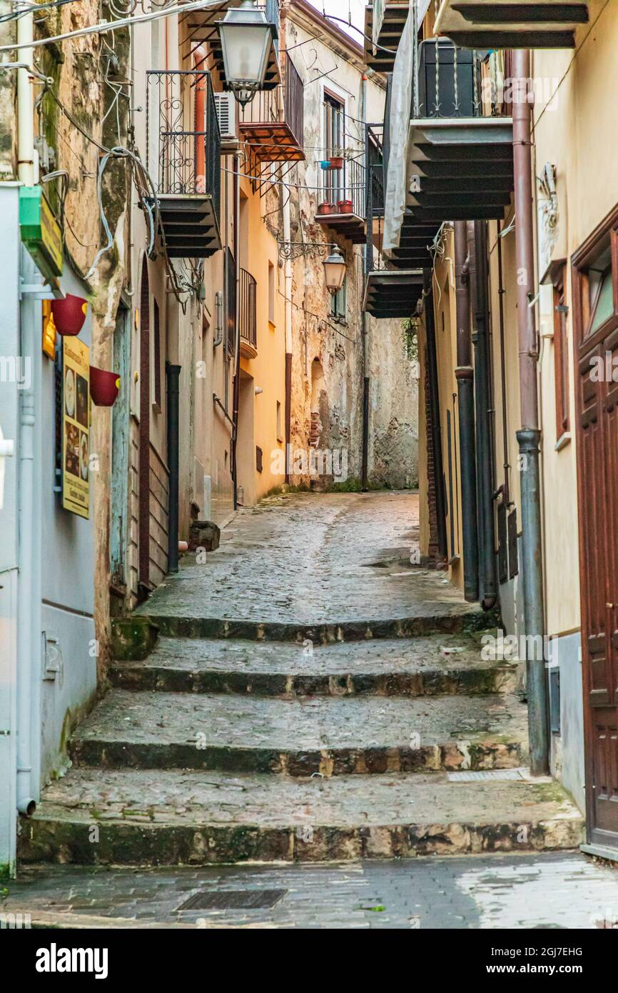 Italy, Sicily, Palermo Province, Castelbuono. A stairway in a narrow ...