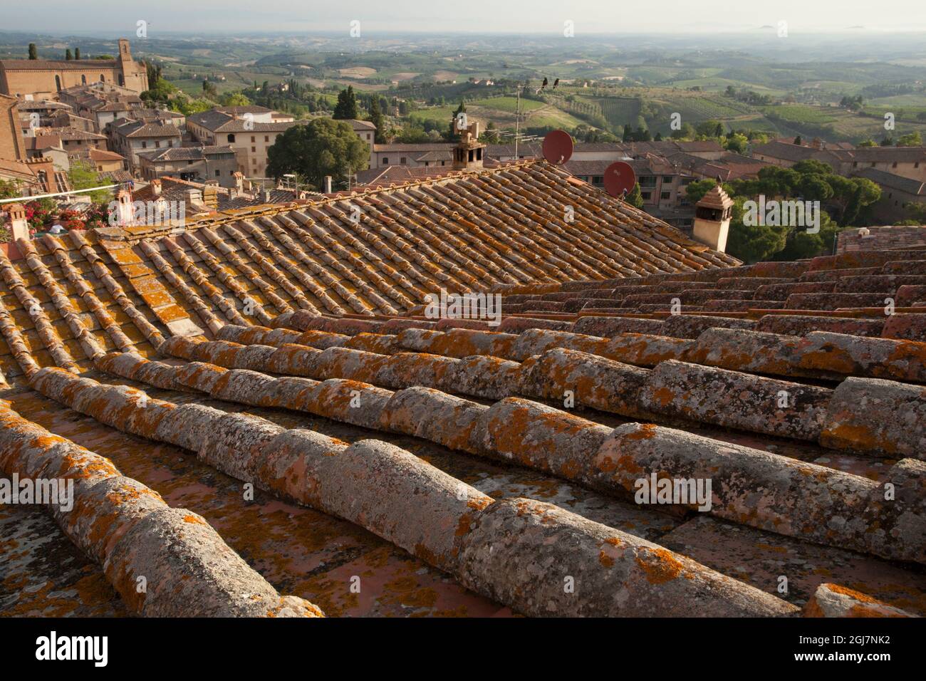 Italy, Tuscany, San Gimignano. Houses, farms and terracotta tiles on ...