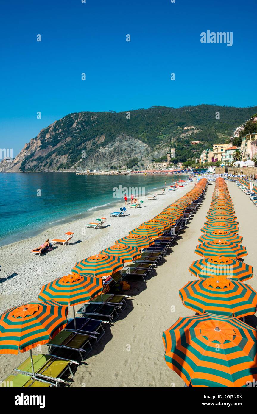Beach umbrellas lining the beach in Monterosso al Mare, Cinque Terre, Italy. (Editorial Use Only ...