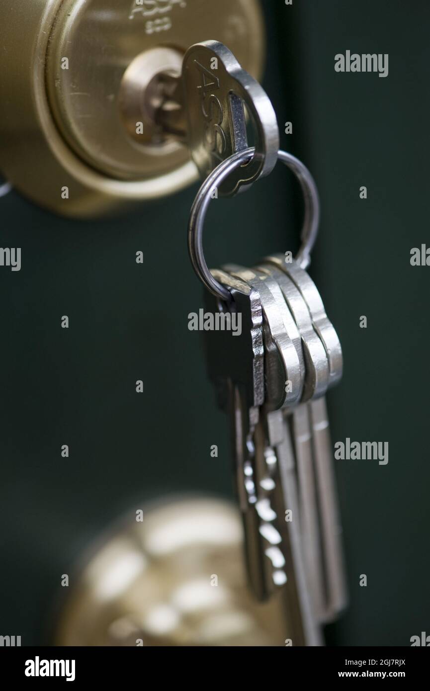 Keys in lock Stock Photo - Alamy