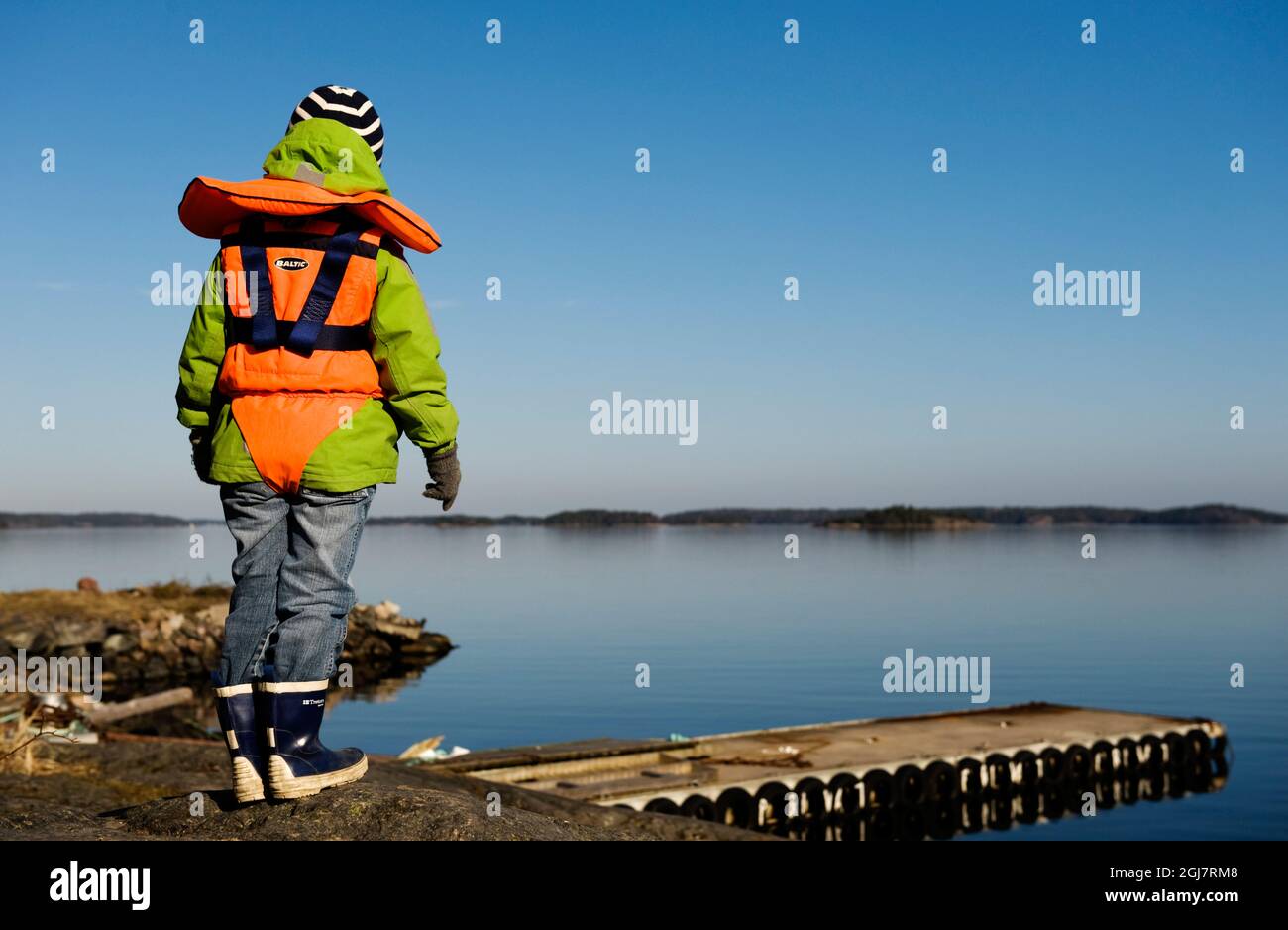 Girl wearing life vest Stock Photo - Alamy
