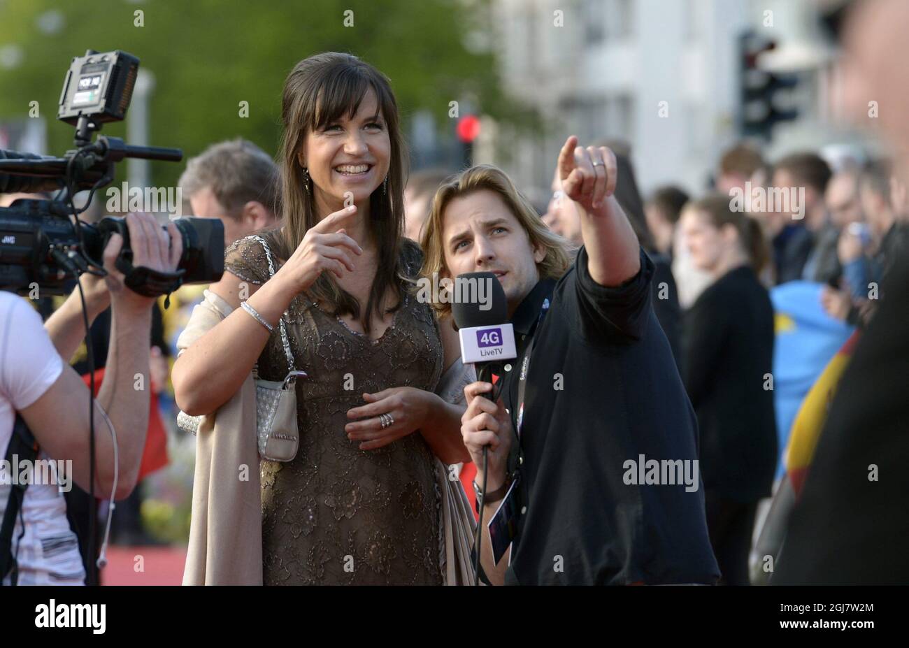Host Petra Mede is interviewed by Martin Rolinski on the red carpet ...