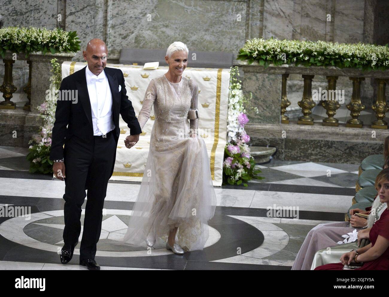 STOCKHOLM 20130608 Marie Fredriksson and husband Mikael Boyloys arrive ...