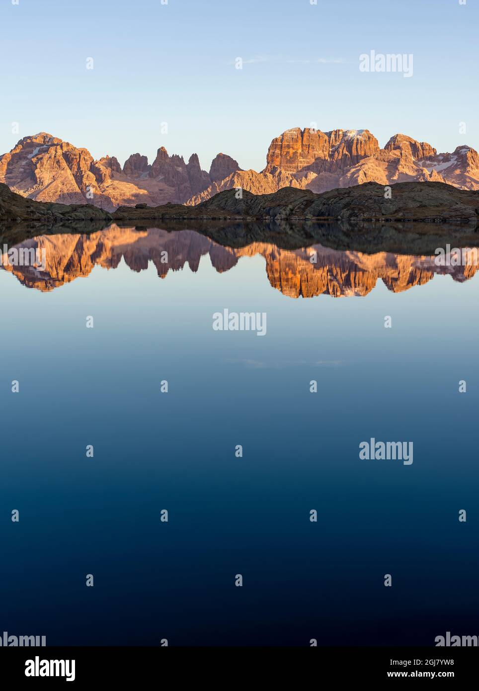 The summits of Brenta mountain range are reflected in Lago Nero. Brenta ...