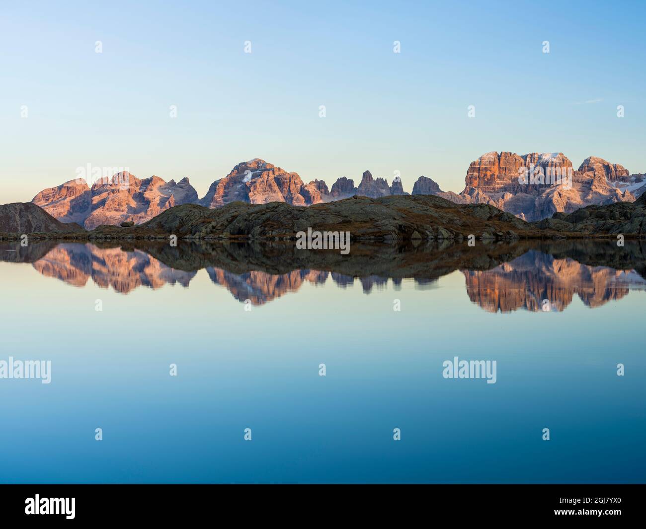 The summits of Brenta mountain range are reflected in Lago Nero. Brenta ...