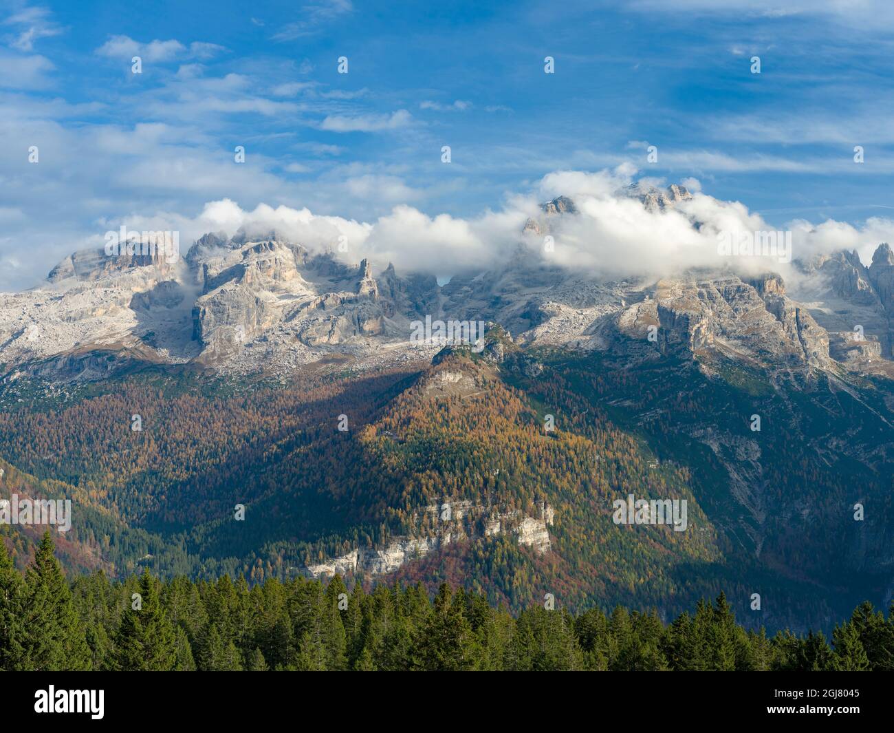 The summits of Brenta mountain range towering above Madonna di ...
