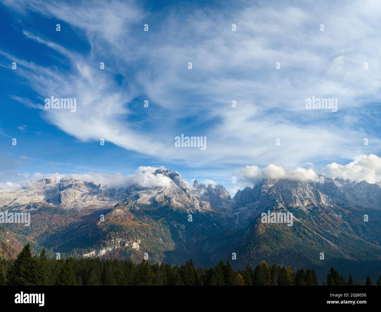 The summits of Brenta mountain range towering above Madonna di ...