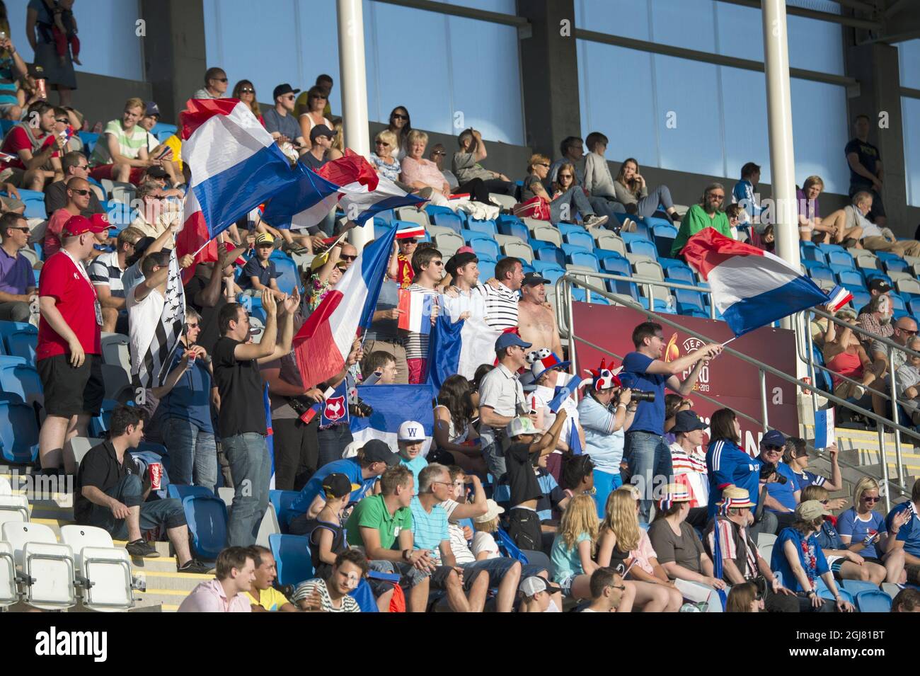 French fans wave flags in stands hi-res stock photography and images ...