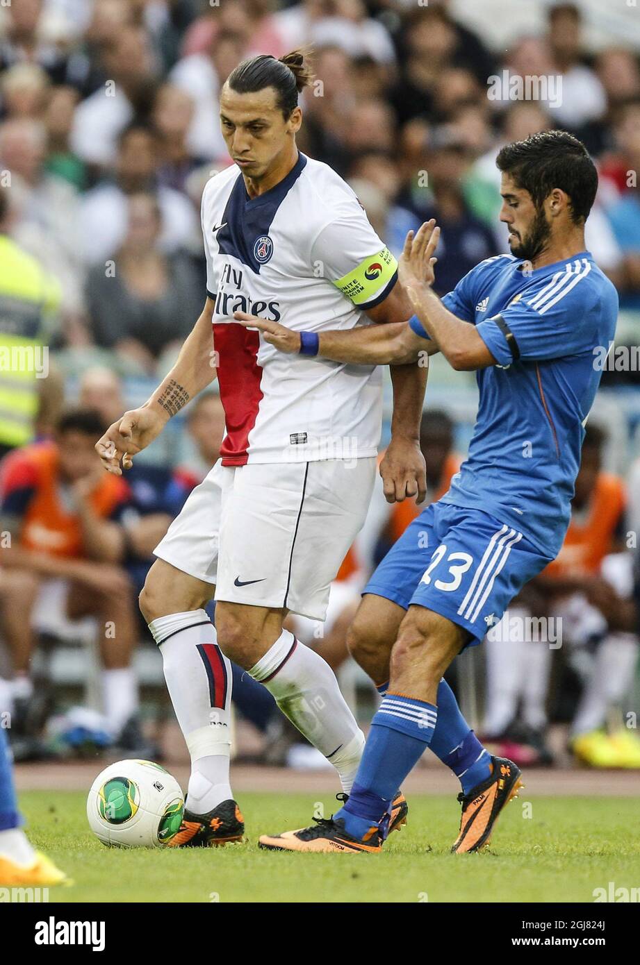 Zlatan Ibrahimovic, left, of Paris SG, is attacked by Isco, right, of ...