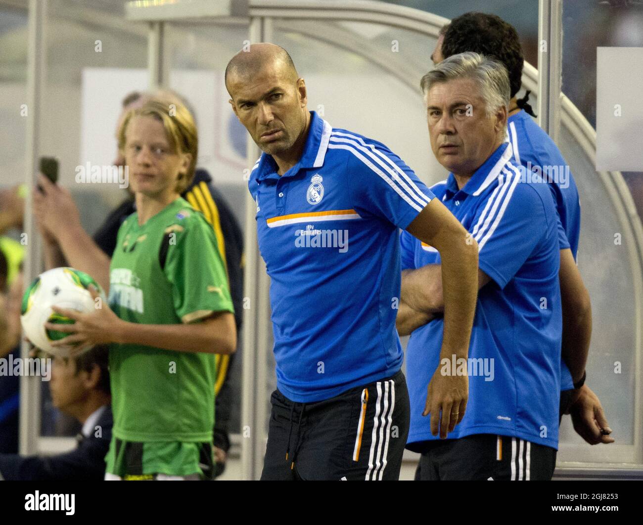 Real Madrid's Assistant Coach Zinedine Zidane and coach Carlo Ancelotti ...