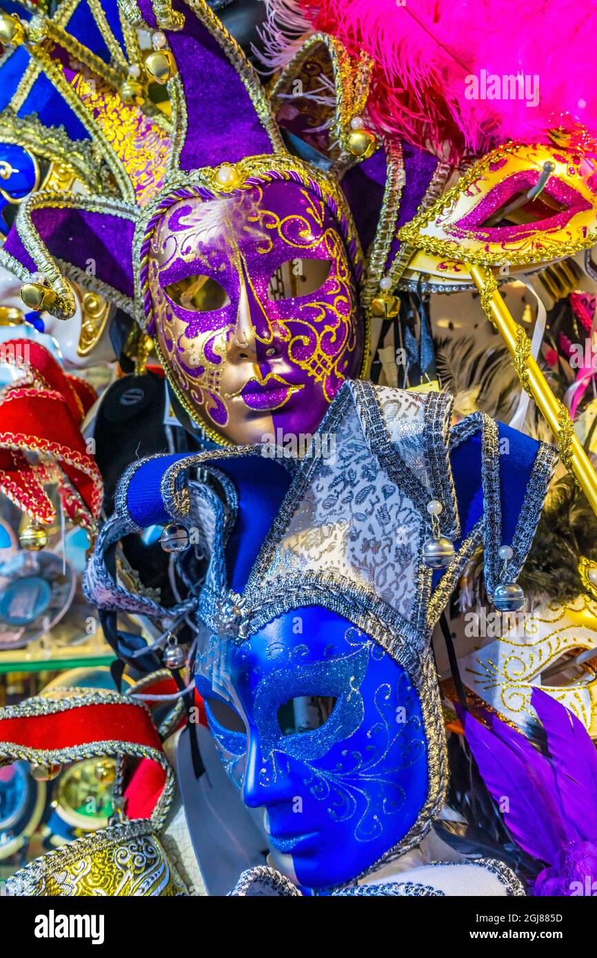 Traditional colorful blue, purple Venetian masks, Venice, Italy. Used ...