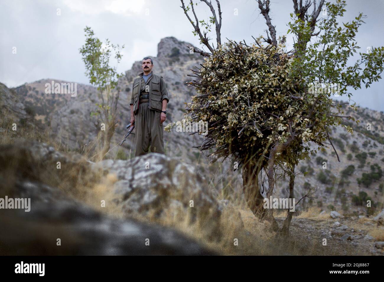 KURDISTAN 20131020 An armed PKK member in the inaccessible Qandil ...
