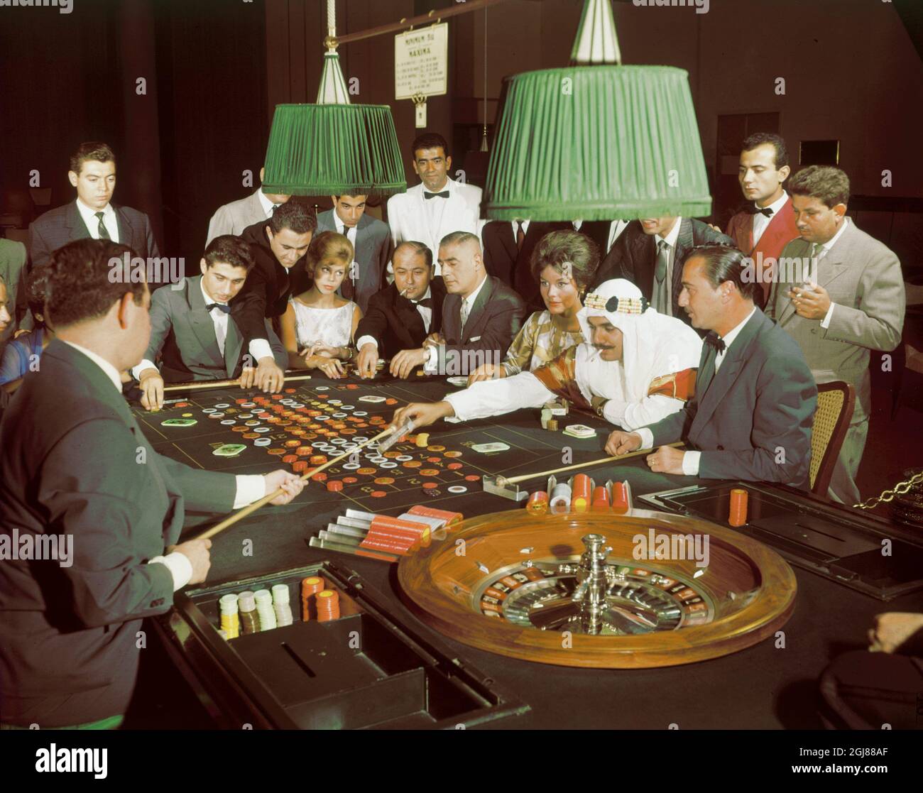 BEIRUT PhotoDate:196?-??-?? FILE Men and a women sitting around a ...