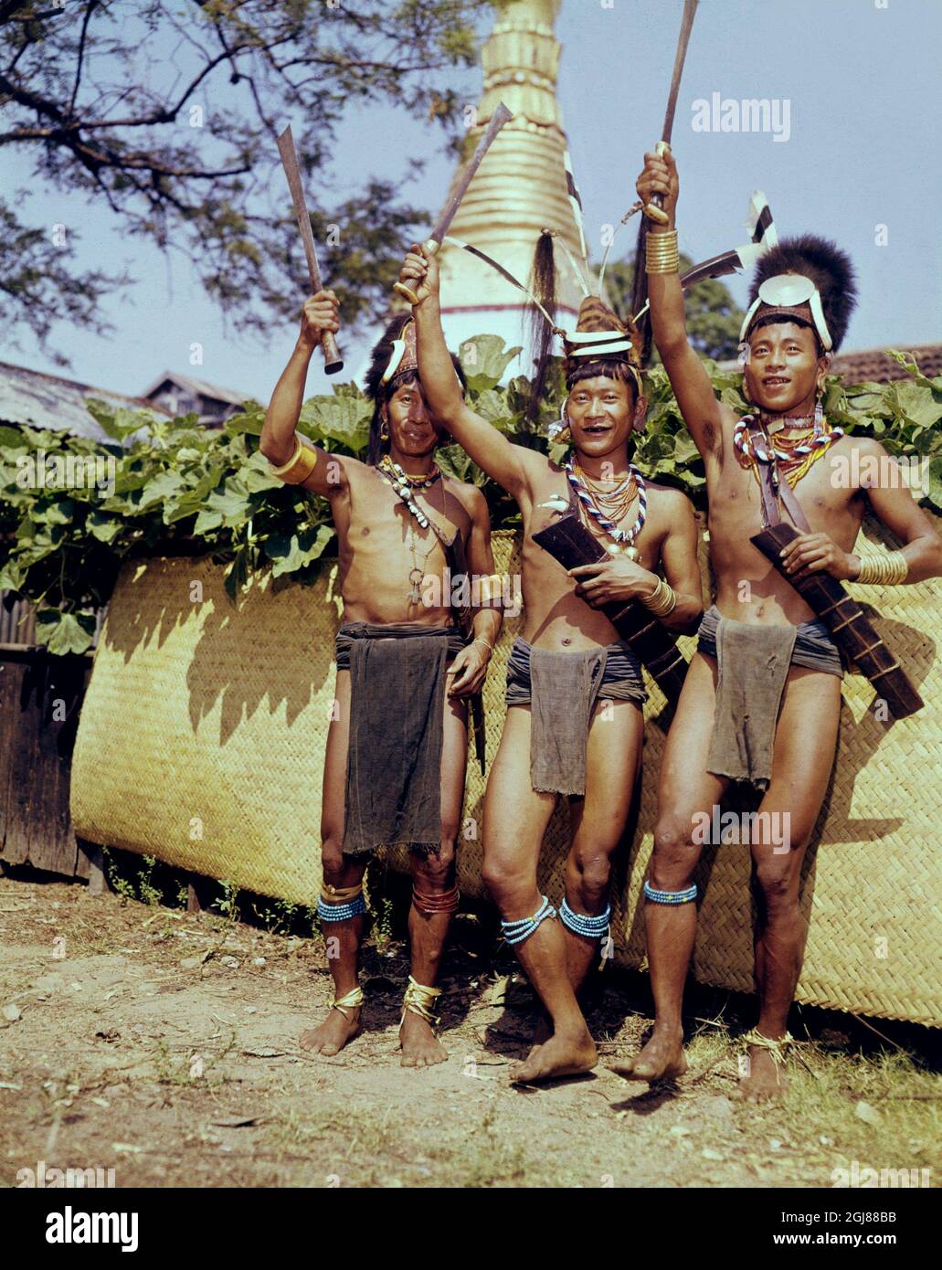 BURMA PhotoDate:196?-??-?? FILE Three young men, members of the Naga ...