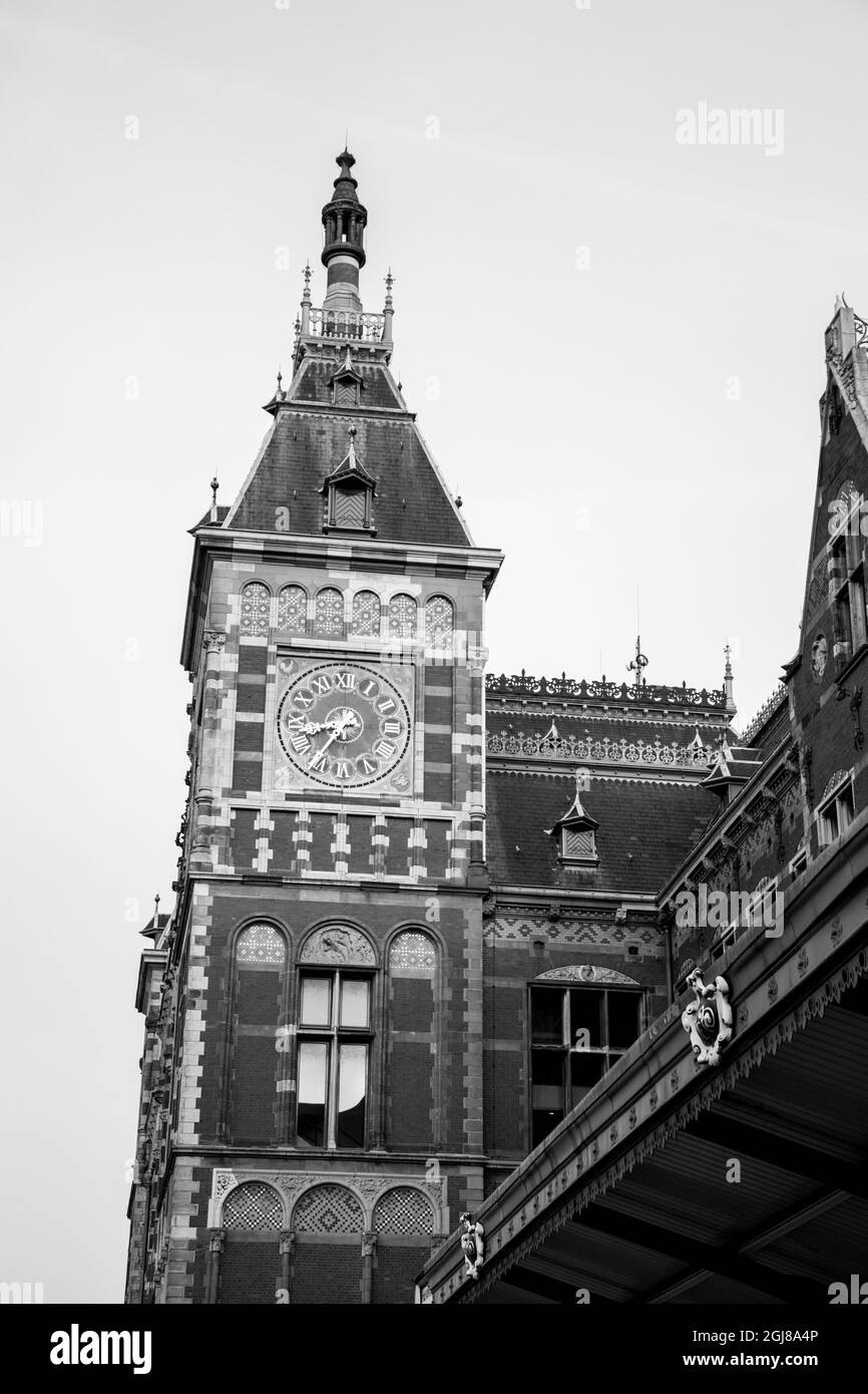 Europe, Netherlands, Amsterdam. Clock tower at Central Station Stock ...