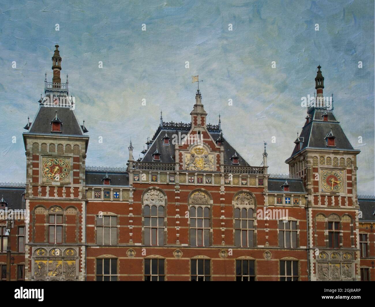Netherlands, Amsterdam. Amsterdam Centraal Station with twin clock ...