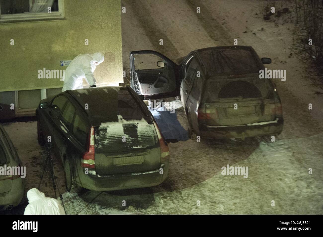 STOCKHOLM 20140123 Police forensic team is seen working at the scene of ...