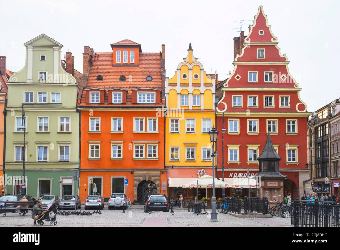 Colorful buildings make up one side of Wroclaw Town Square in Poland ...