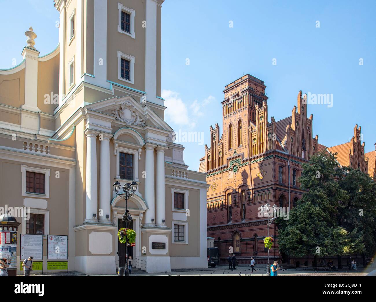 Two dominant buildings in Torun's town square, one of the oldest cities ...
