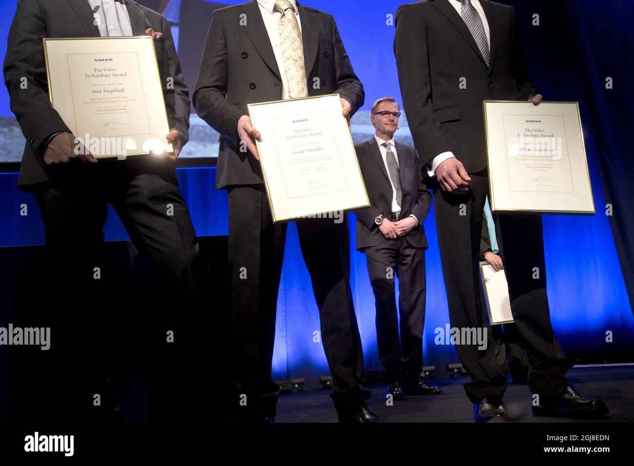 Volvo CEO Olof Persson stands behind three winners of the Volvo ...