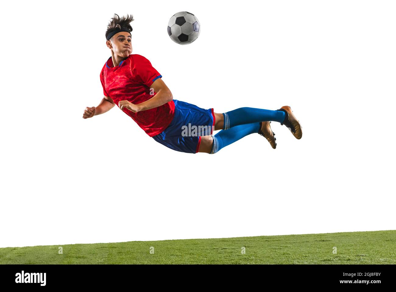 Young Caucasian soccer football player training isolated on white ...