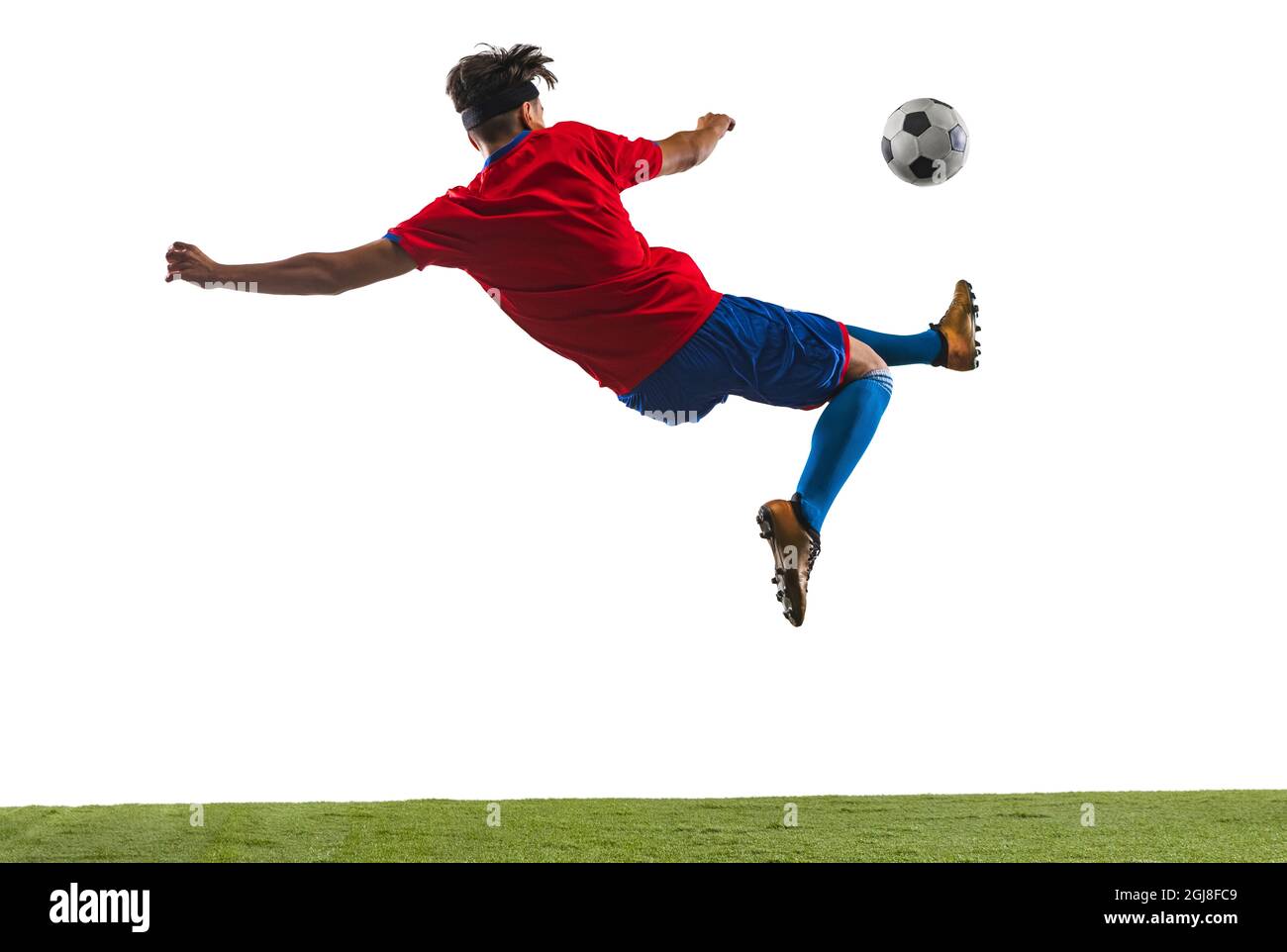Full-length horizontal portrait of young sportsman, soccer football ...