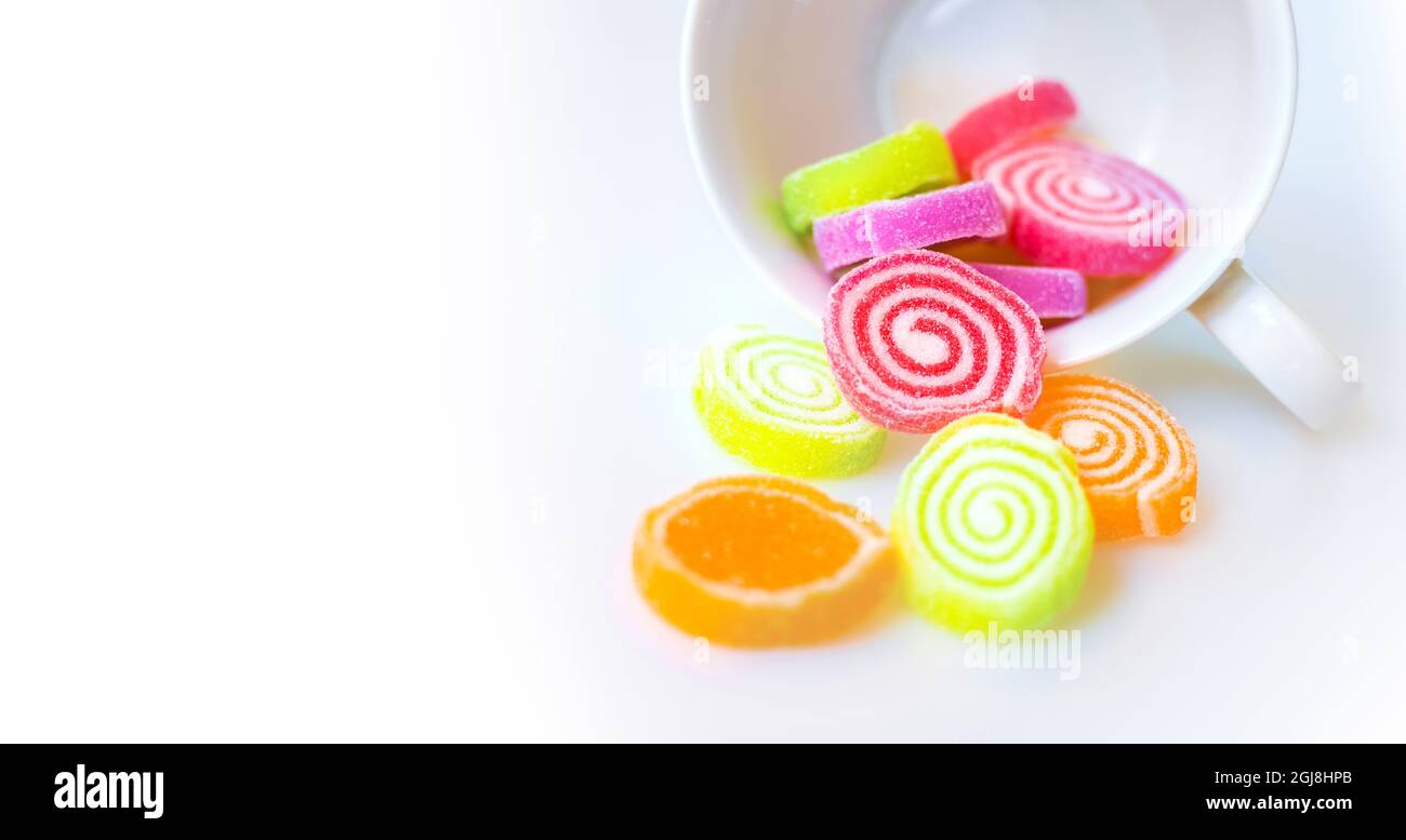 colorful sweets and sugar candies on a white background Stock Photo - Alamy