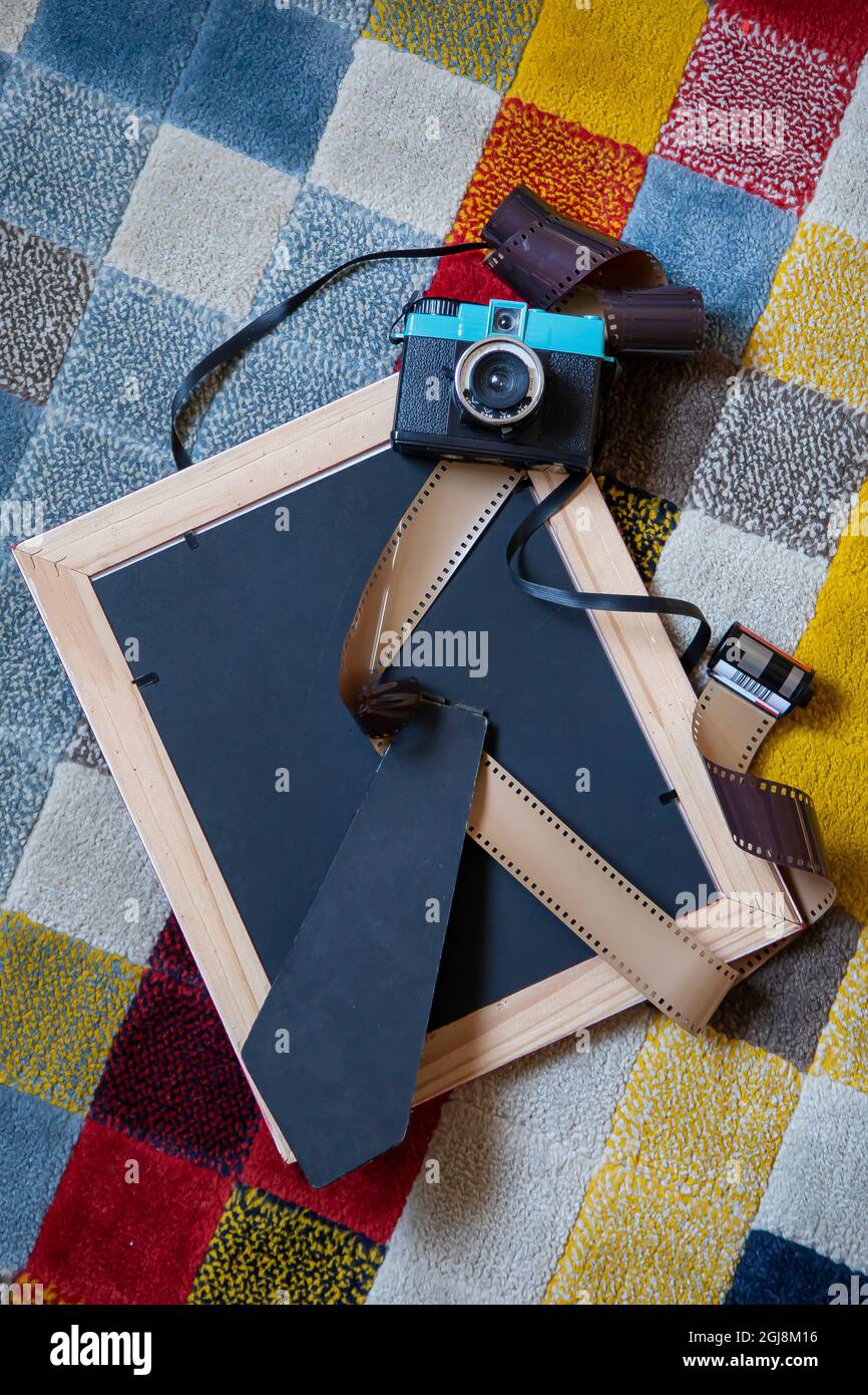 old photo camera and frame Stock Photo - Alamy