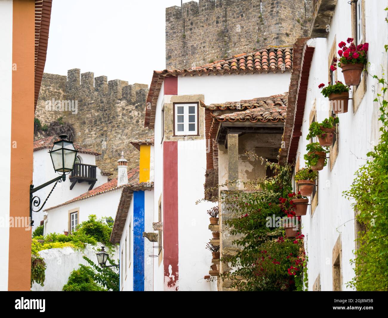Portugal, Obidos. Graphic buildings inside the walled town Stock Photo ...