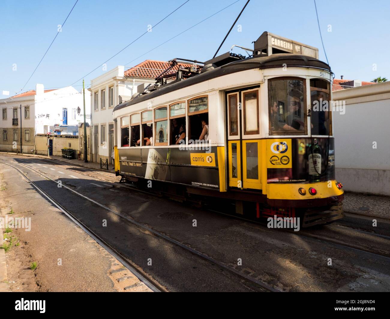 Portugal, Lisbon, View of yellow tramway Stock Photo - Alamy