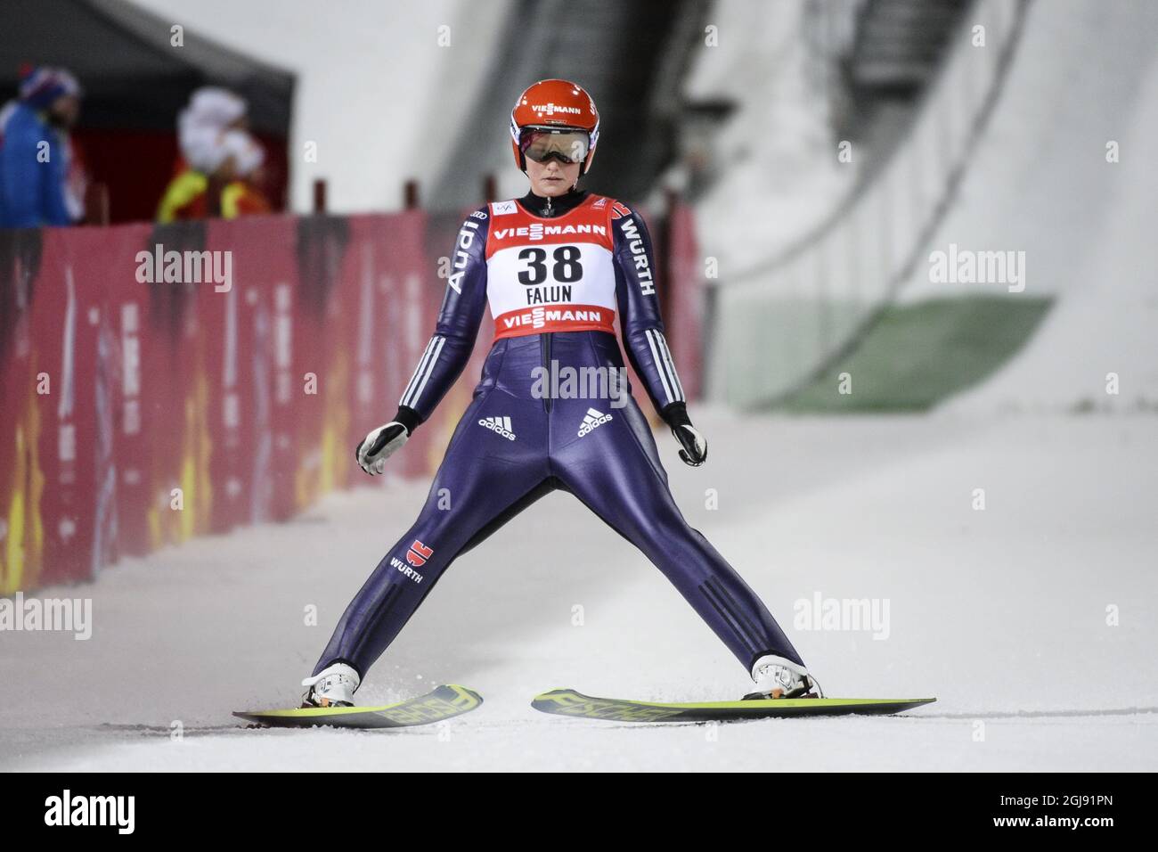 Winner Carina Vogt of Germany in action during the ski jumping event at ...