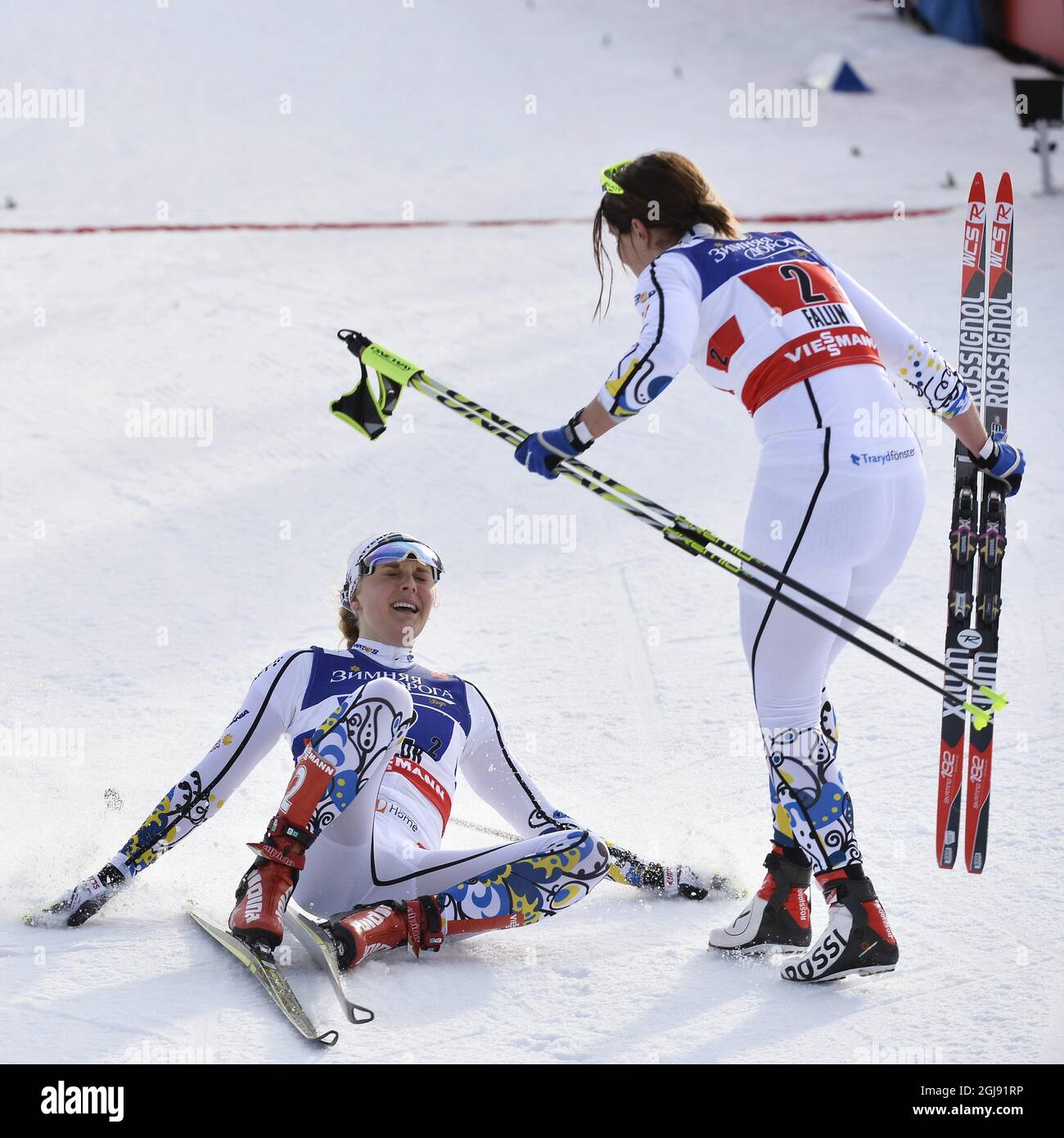 Ida Ingemarsdotter (R) and Stina Nilsson of Sweden react after crossing ...