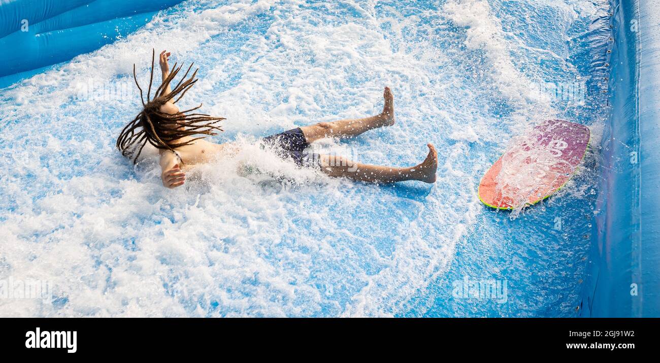 Hanover, Germany. 09th Sep, 2021. Lars falls off his surfboard while ...