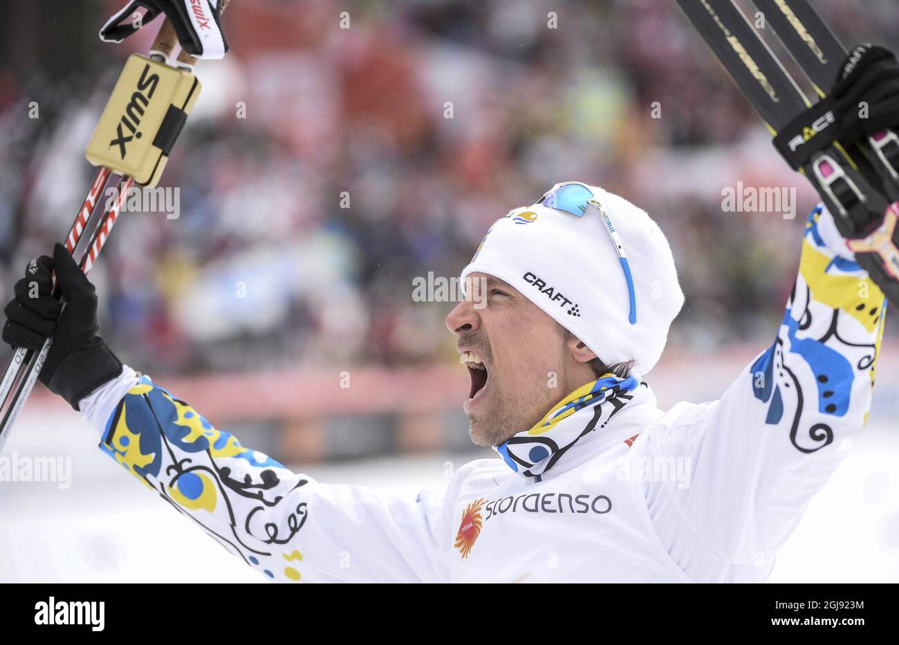 Sweden's Johan Olsson reacts after winning the menÃ¢Â€Â™s 15 km (F ...