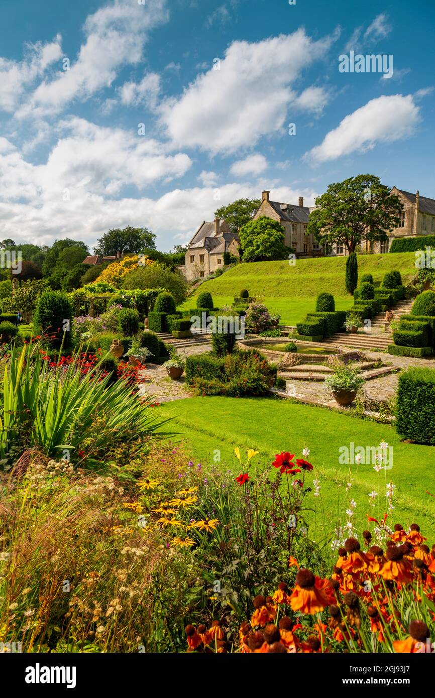 The colourful borders and topiary in the italianate Fountain Court ...