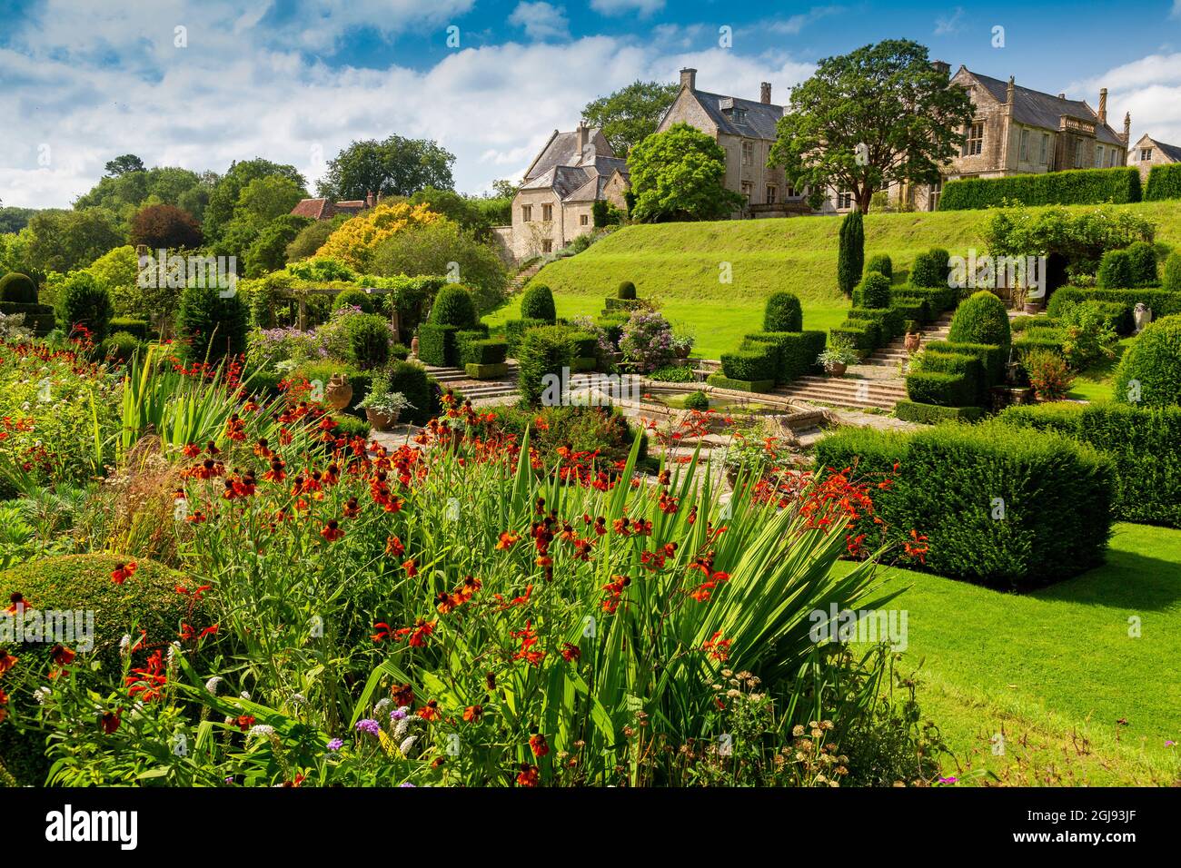 The colourful borders and topiary in the italianate Fountain Court ...