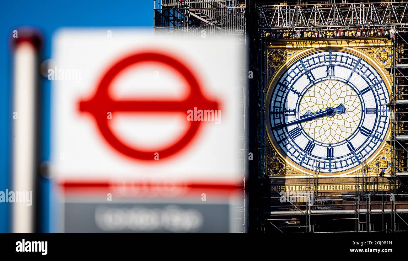 The Big Ben clock tower restored with dials and clock hands repainted ...