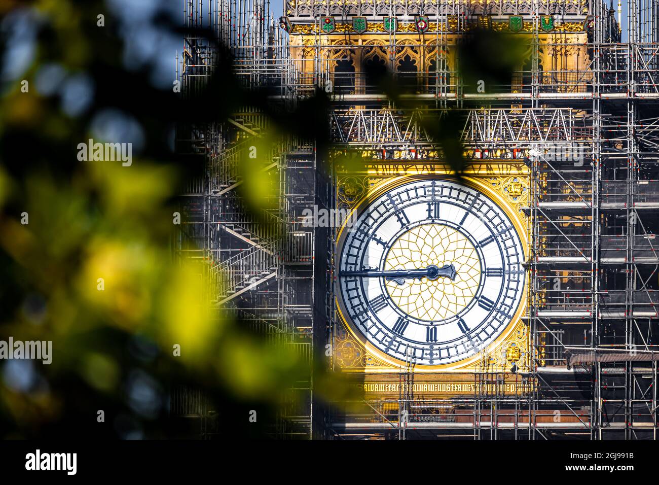 The Big Ben clock tower restored with dials and clock hands repainted ...