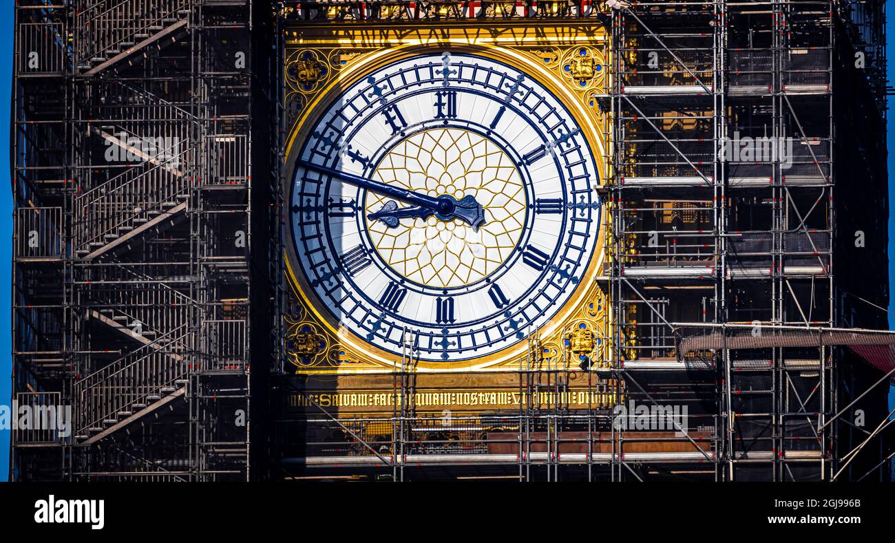 The Big Ben clock tower restored with dials and clock hands repainted ...