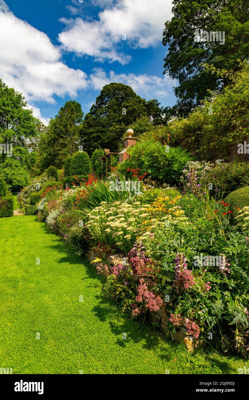 The colourful herbaceous borders in the italianate Fountain Court ...