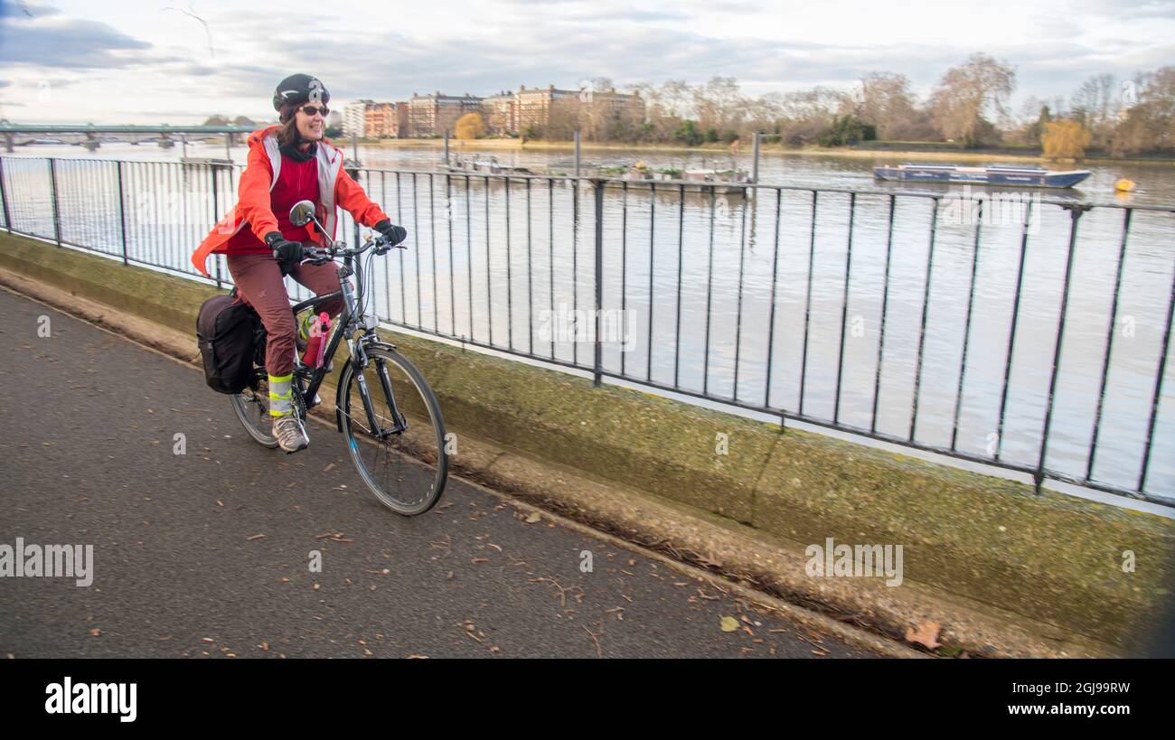 Cycling on the Thames Path at Wandsworth Park, London, U.K Stock Photo ...