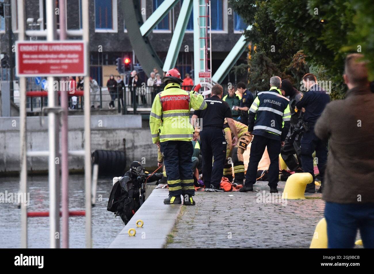 Divers survey the scene after Chris Stokes from Liverpool, England ...