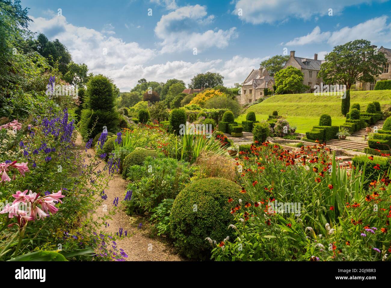 The colourful borders and topiary in the italianate Fountain Court ...