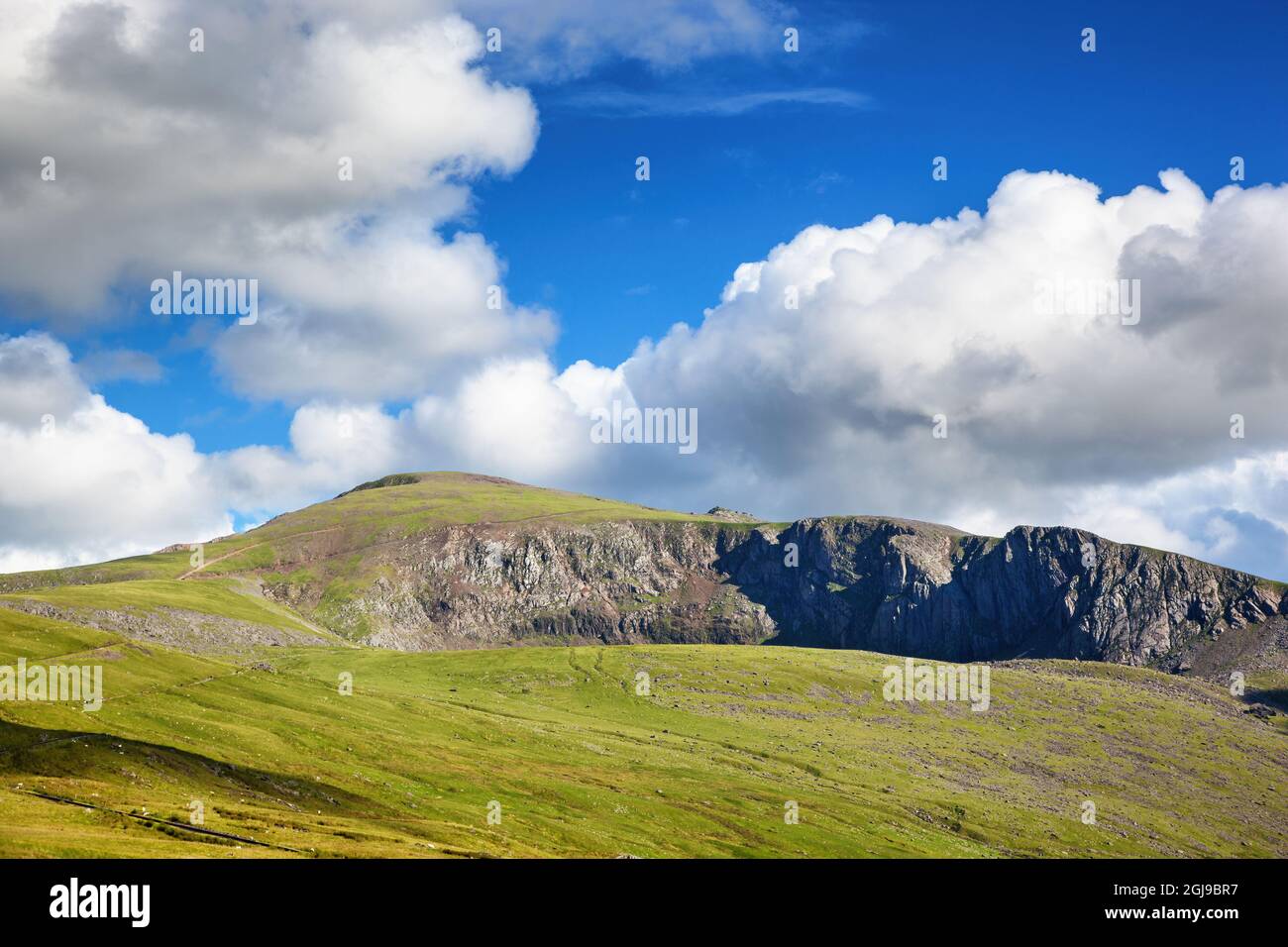 A view of the mountain peaks of Snowdonia, North Wales. Summer day with ...