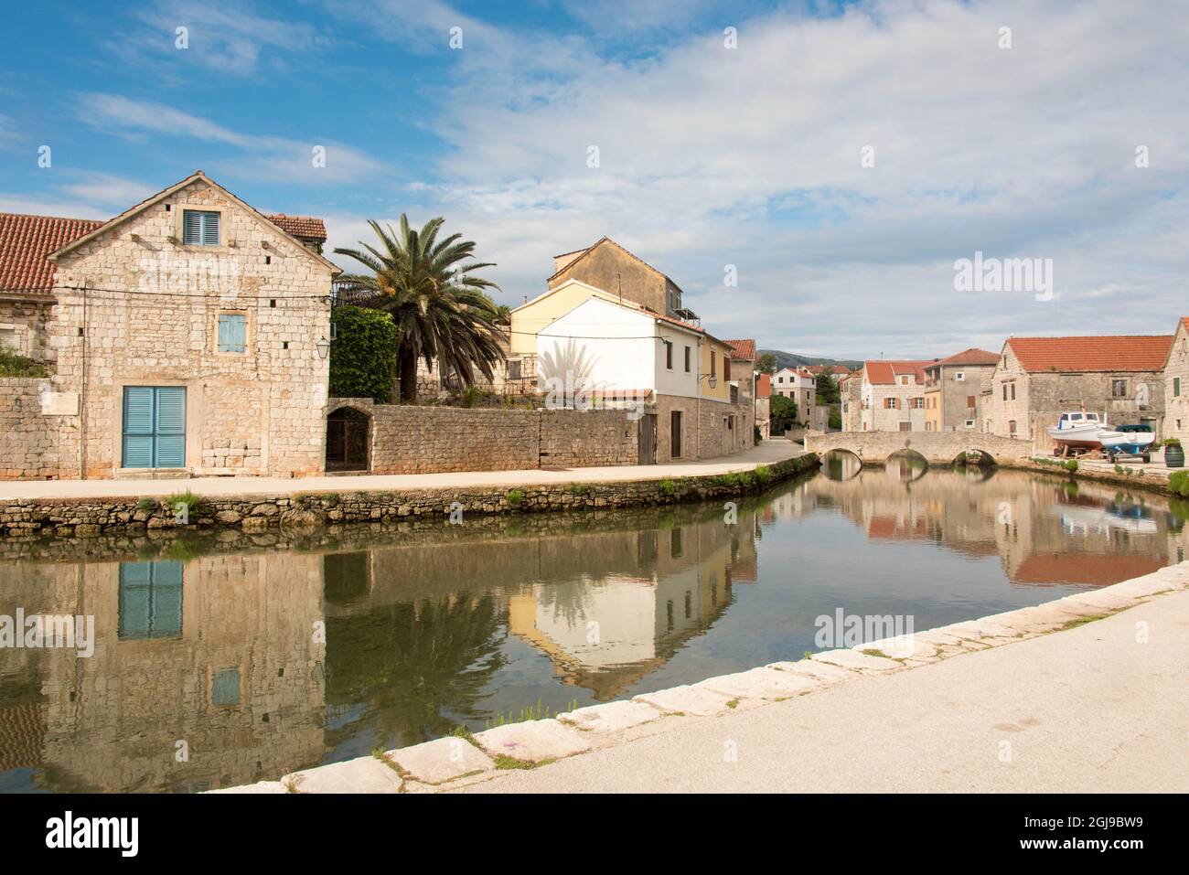 Croatia, Hvar Island, Vrboska. Known as Little Venice for its canals ...