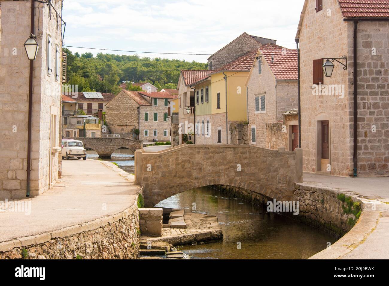 Croatia, Hvar Island, Vrboska. Known as Little Venice for its canals ...