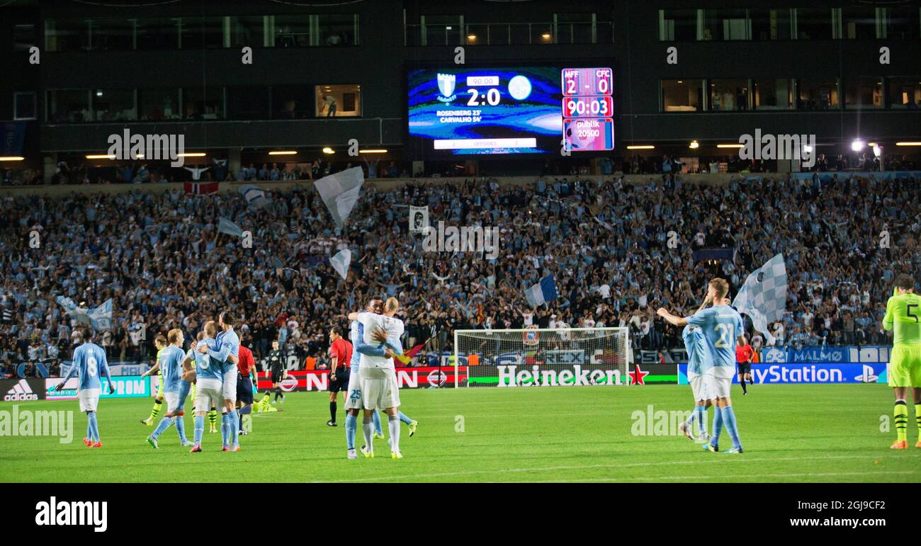 Malmo players celebrate their 2-2 win after the UEFA Champions League ...